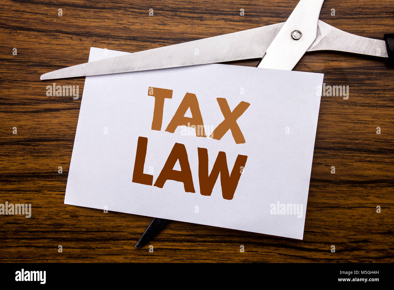Hand writing text caption inspiration showing Tax Law. Business concept ...