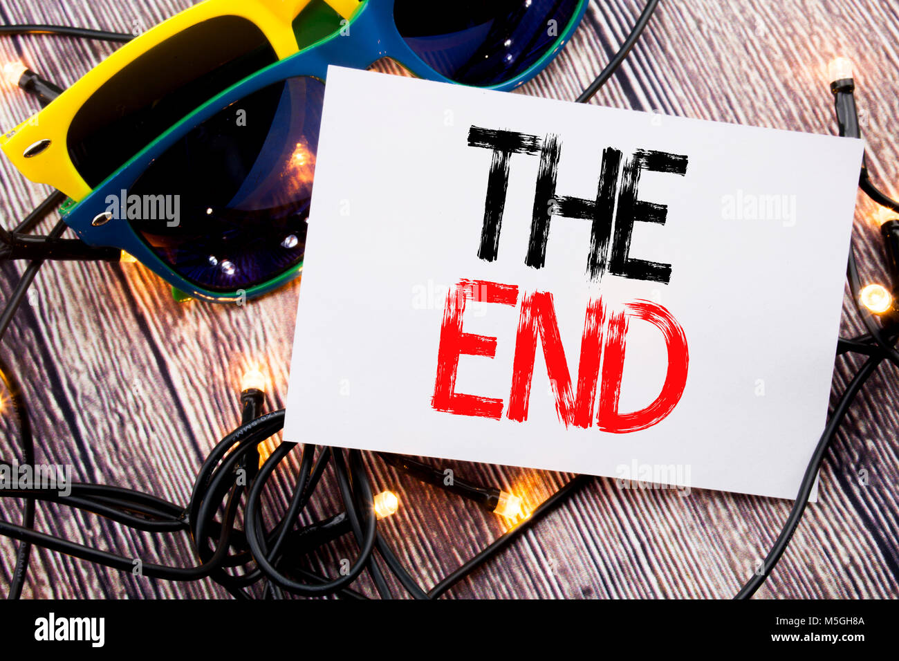 Writing text showing The End. Business concept for End Finish Close ...