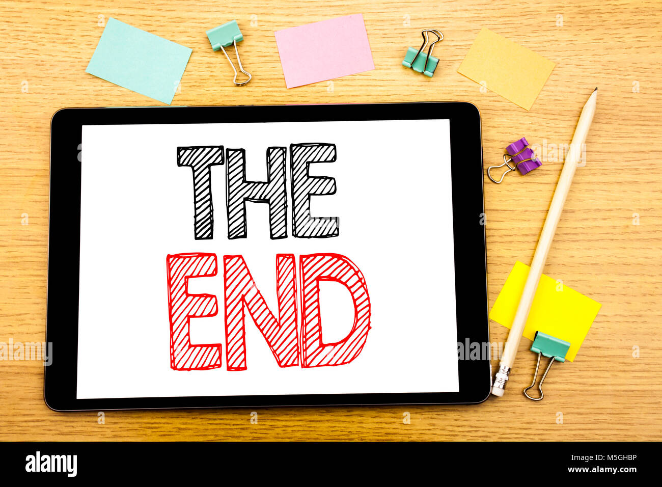 Writing text showing The End. Business concept for End Finish Close ...