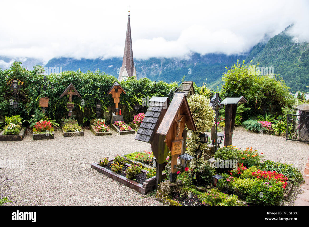 Traditional wooden graves and tombs in the catholic cemetery in ...