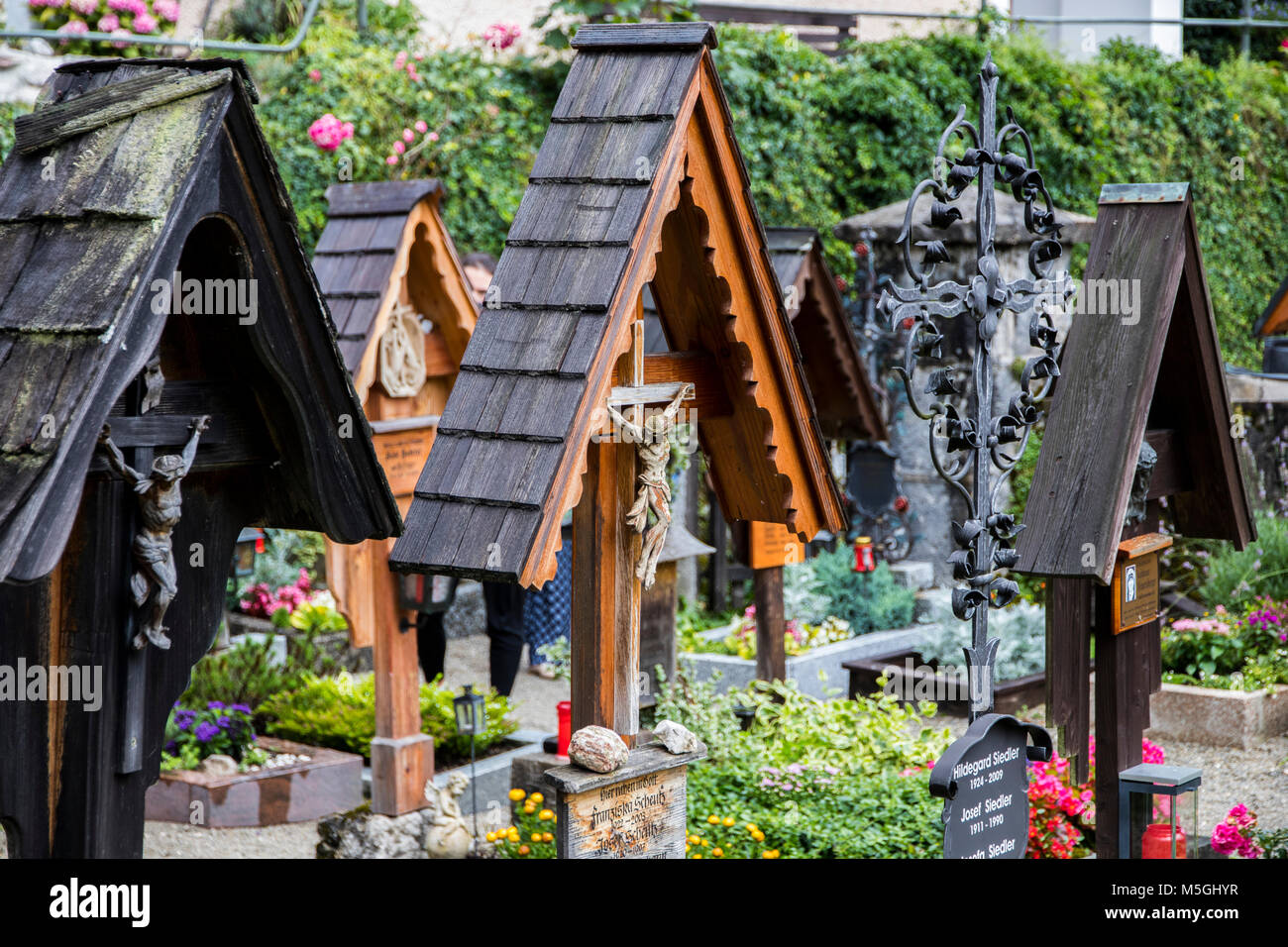 Traditional wooden graves and tombs in the catholic cemetery in ...