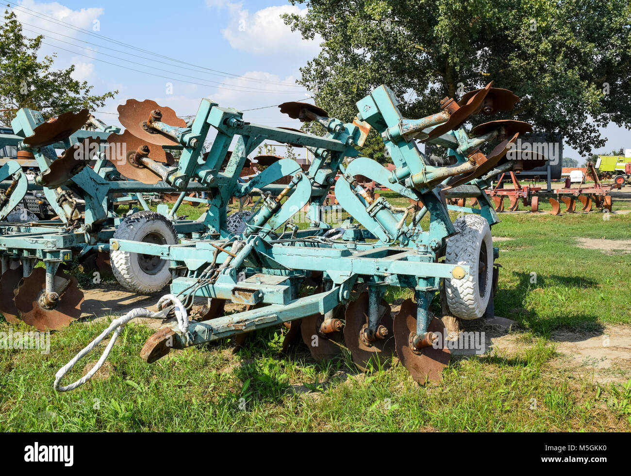 Plow on trailer for tractor. Plow for plowing soil. Trailer Hitch for ...