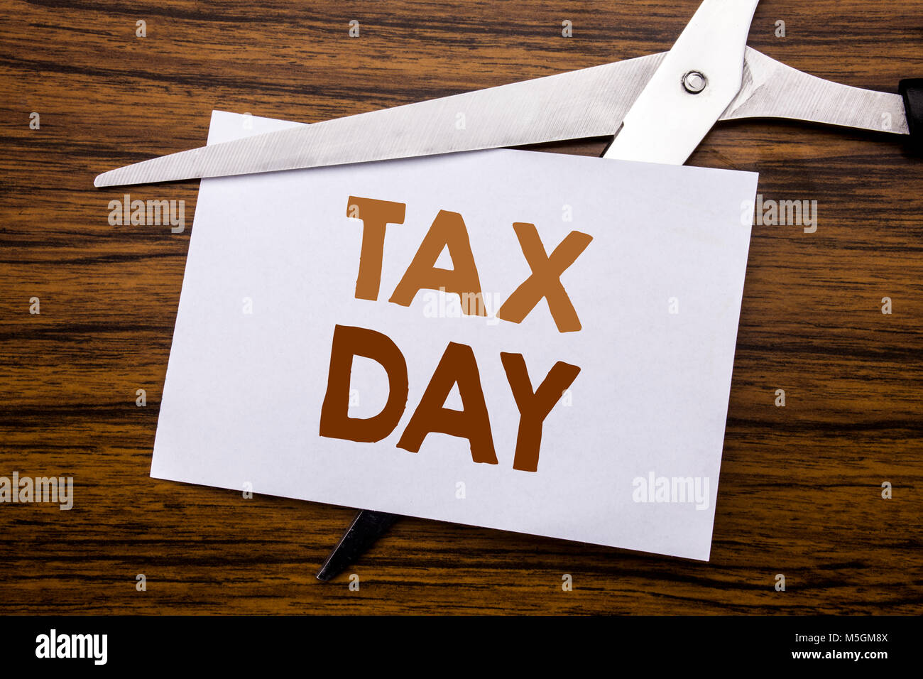 Hand writing text caption inspiration showing Tax Day. Business concept ...
