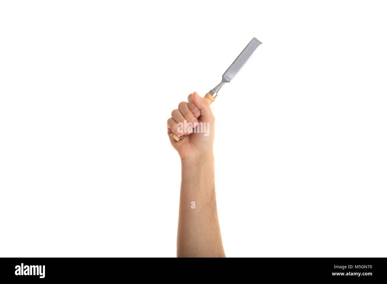 Hand holding a chisel tool on white background Stock Photo - Alamy