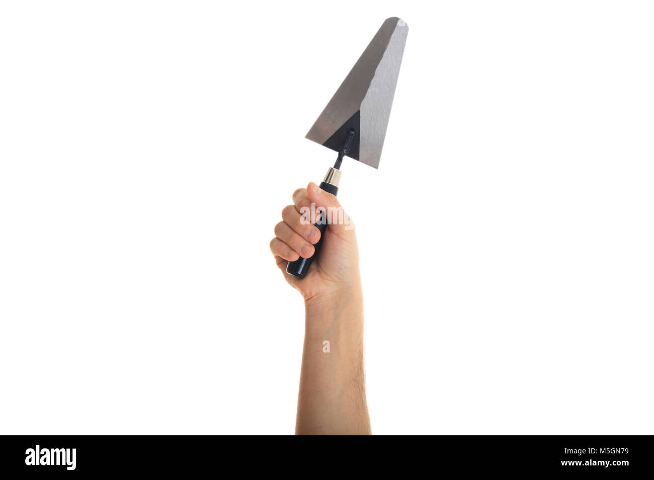 Hand holding a metal trowel on white background Stock Photo - Alamy