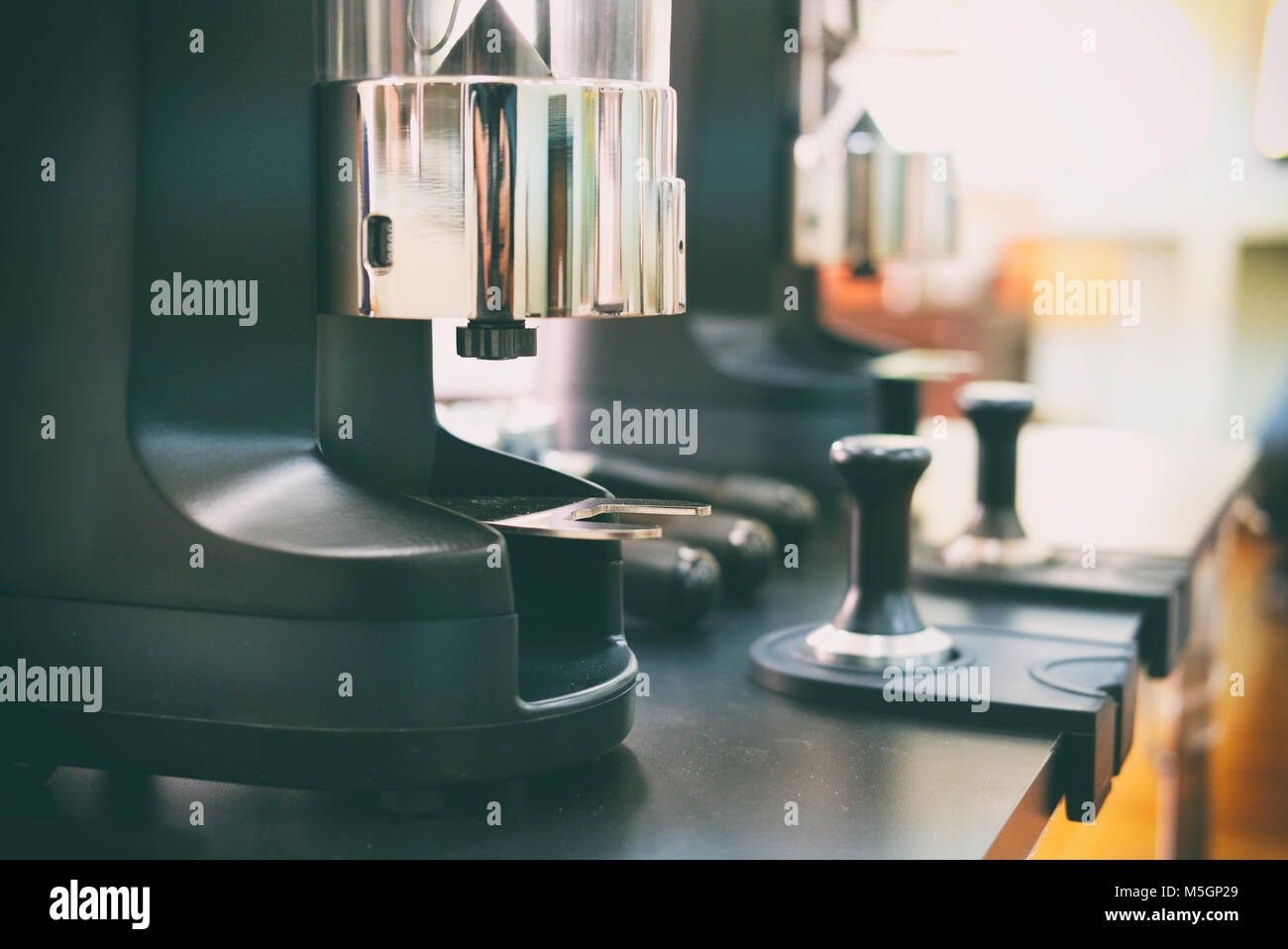 electric coffee grinder machine on bar counter at cafe Stock Photo - Alamy