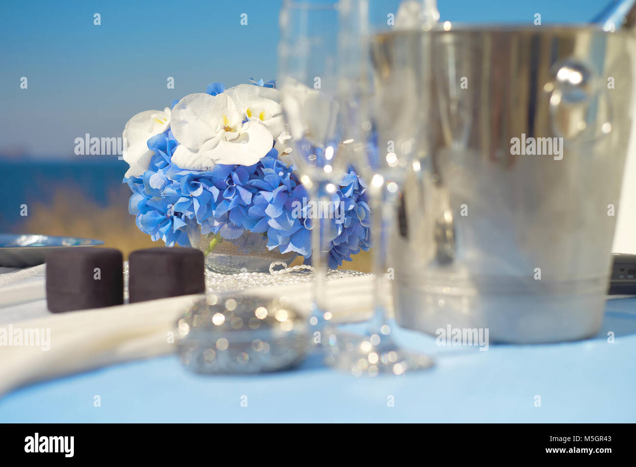 Wedding accessories of white and blue colors Stock Photo - Alamy