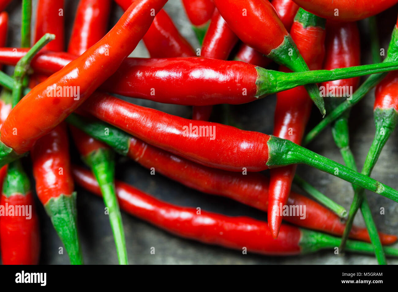 red hot chilli, spicy vegetables food background Stock Photo - Alamy