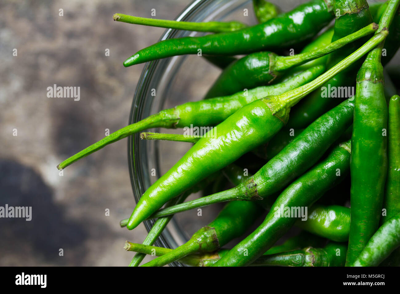 green hot chilli, spicy vegetables food background Stock Photo - Alamy