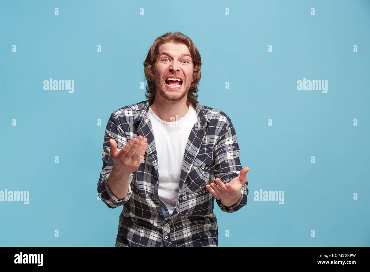 Argue, arguing concept. Beautiful male half-length portrait isolated on ...