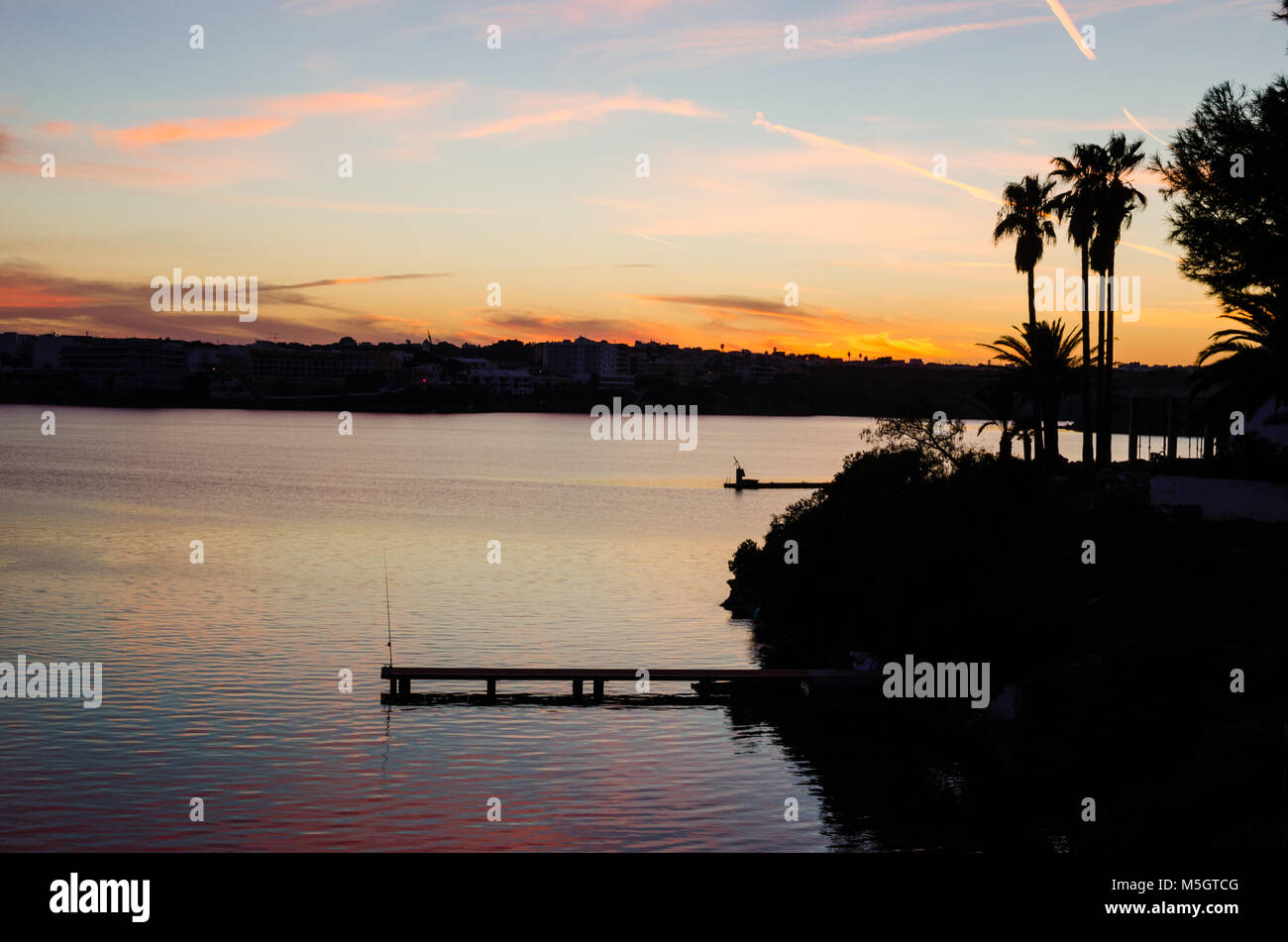 Landscape photography of a sunset in the port of Mahon, Menorca with a ...