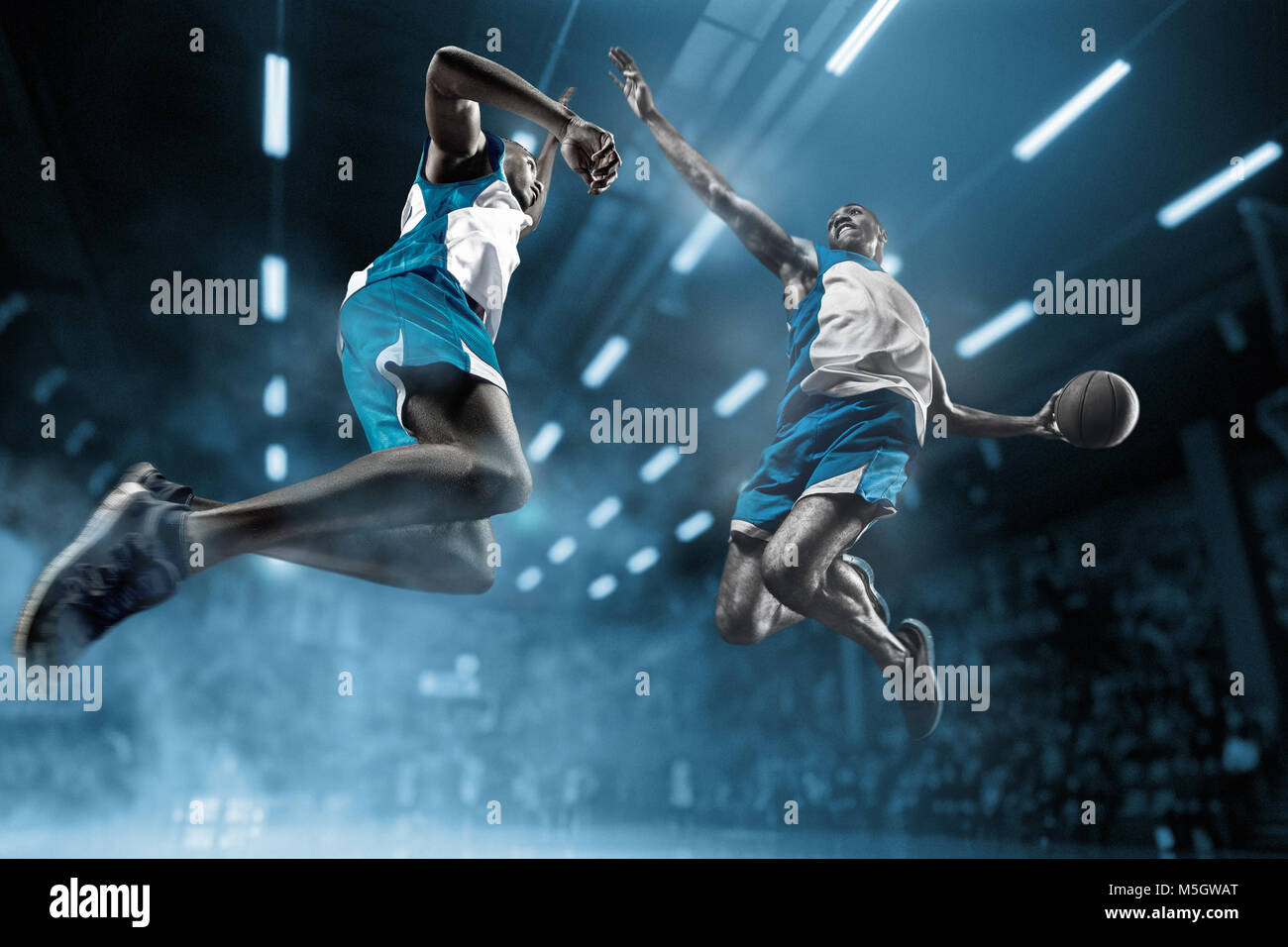 Playing basketball stadium audience hi-res stock photography and images ...
