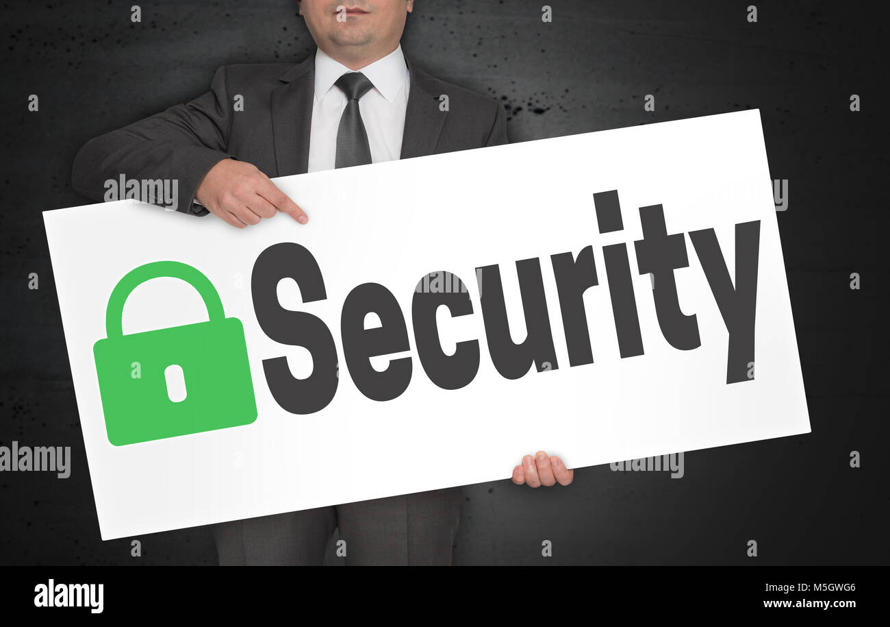 Security poster is held by businessman Stock Photo - Alamy