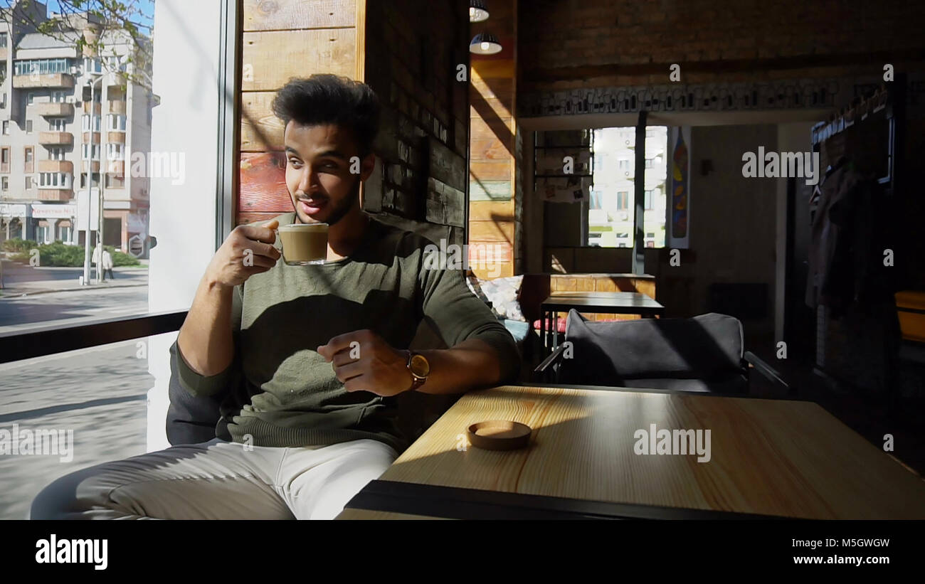 Journalist drinking coffee in lunch time Stock Photo - Alamy