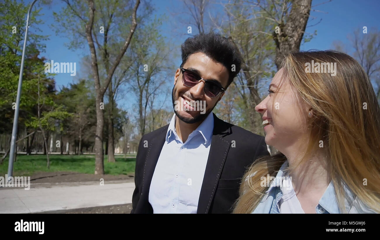 Marriage couple go to kindergarten thought park and laughing Stock ...