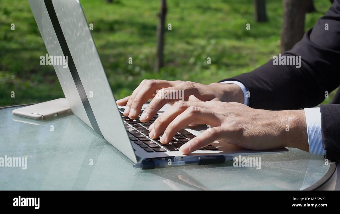 Male freelancer fingers using laptop hi-res stock photography and ...