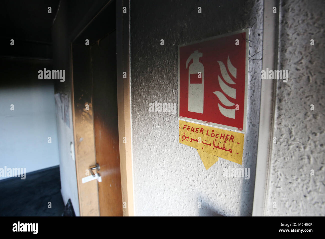 Fire extinguisher hanging on wall hi-res stock photography and images ...