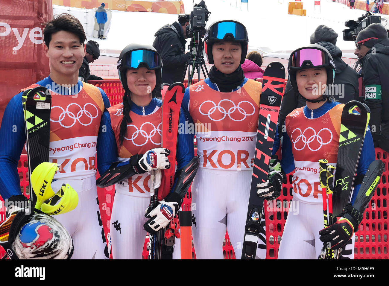 24th Feb, 2018. Alpine team event (From L) Kim Dong-woo, Gim So-hui ...