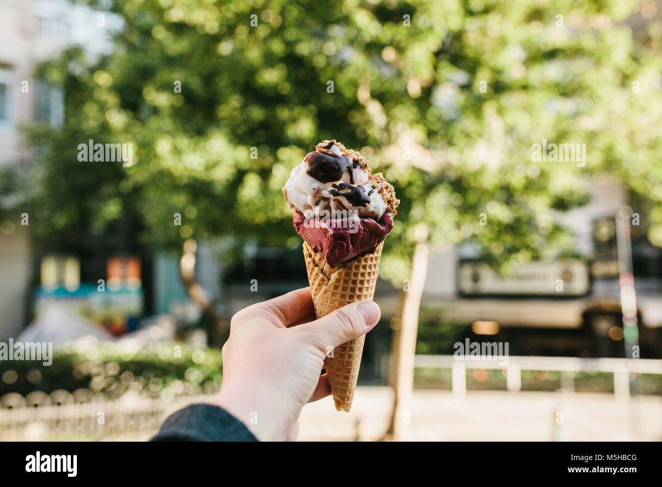 Female hand with ice cream. Delicious food, dessert Stock Photo - Alamy