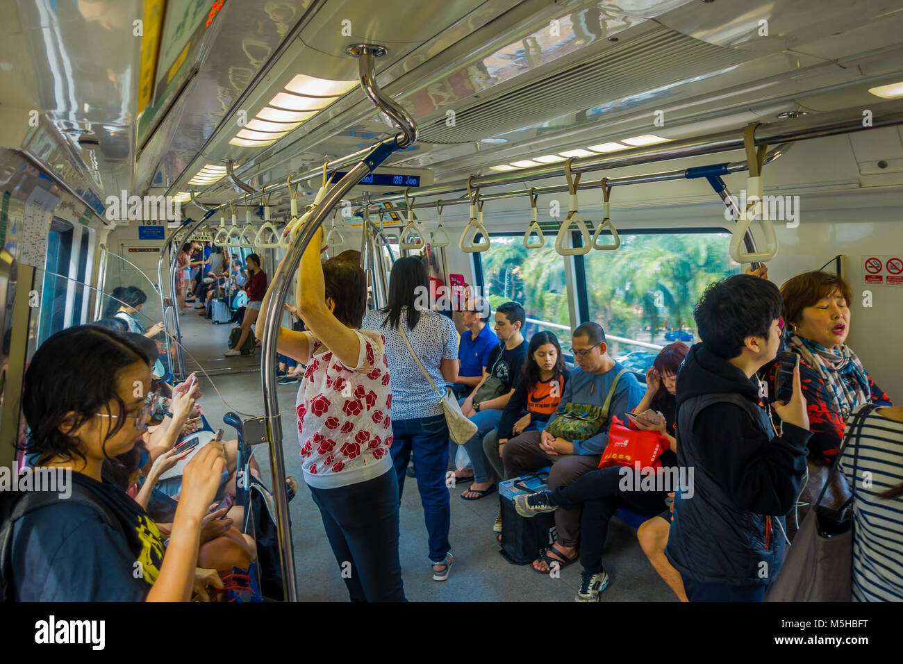 Crowded mrt in singapore hi-res stock photography and images - Alamy