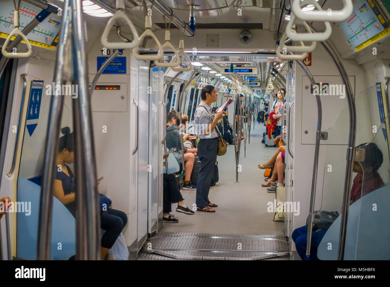 SINGAPORE, SINGAPORE - JANUARY 30, 2018: Indoor view of people in a ...