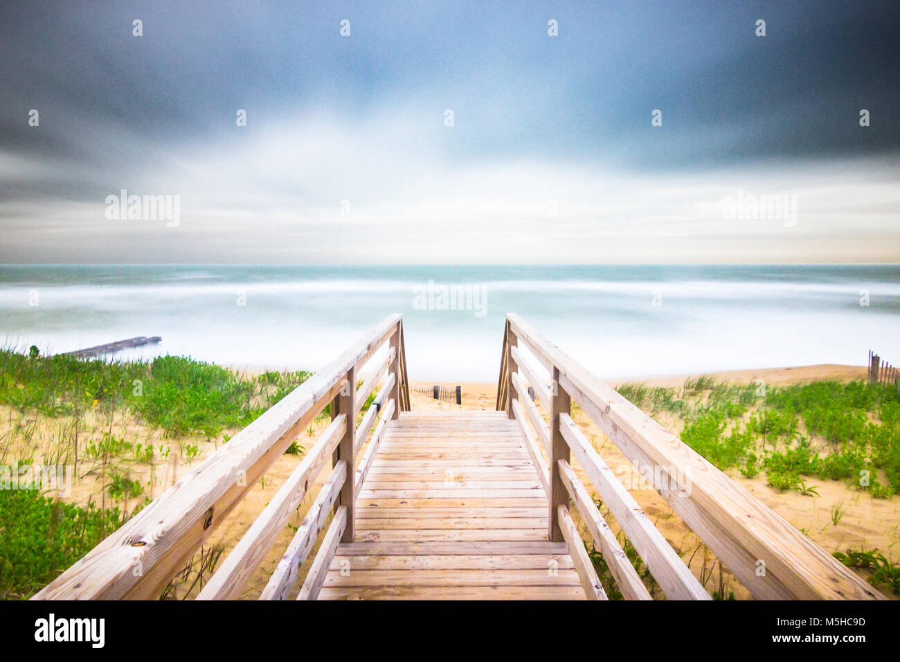 Walkway onto the beach Stock Photo - Alamy
