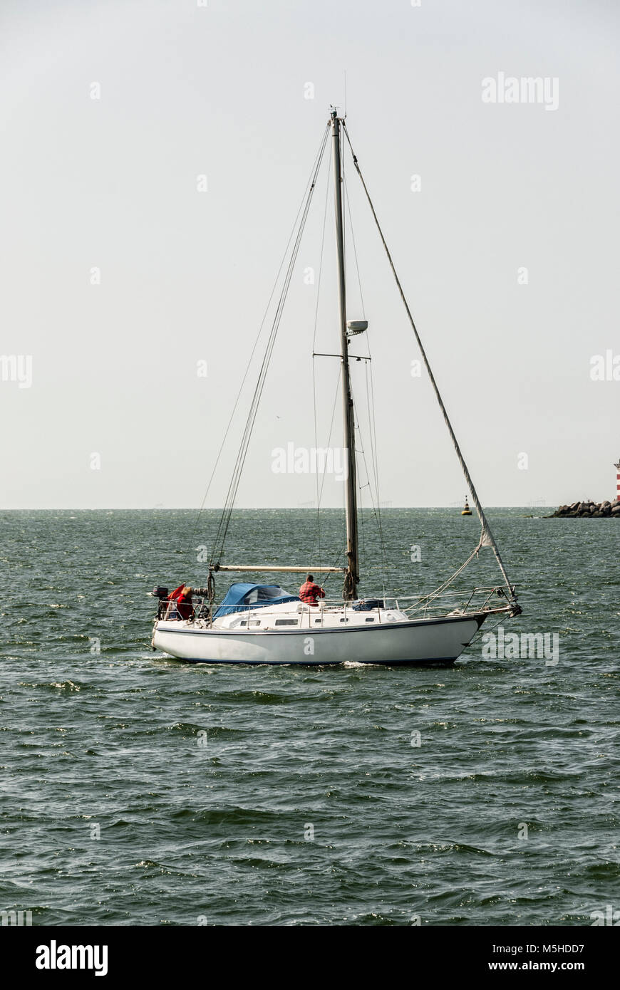 small sailing yacht near the coast Stock Photo - Alamy