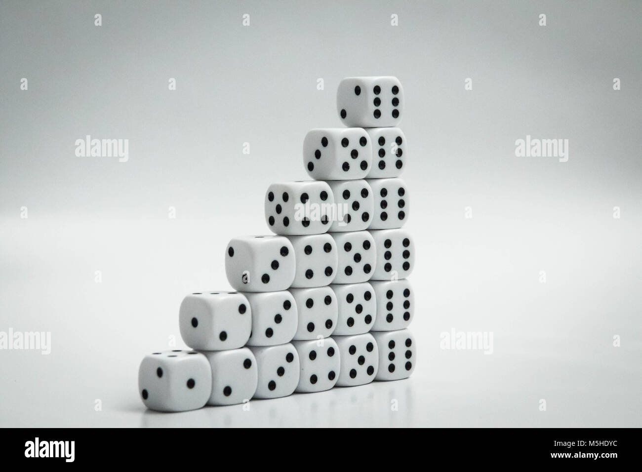 Dice pyramid hi-res stock photography and images - Alamy
