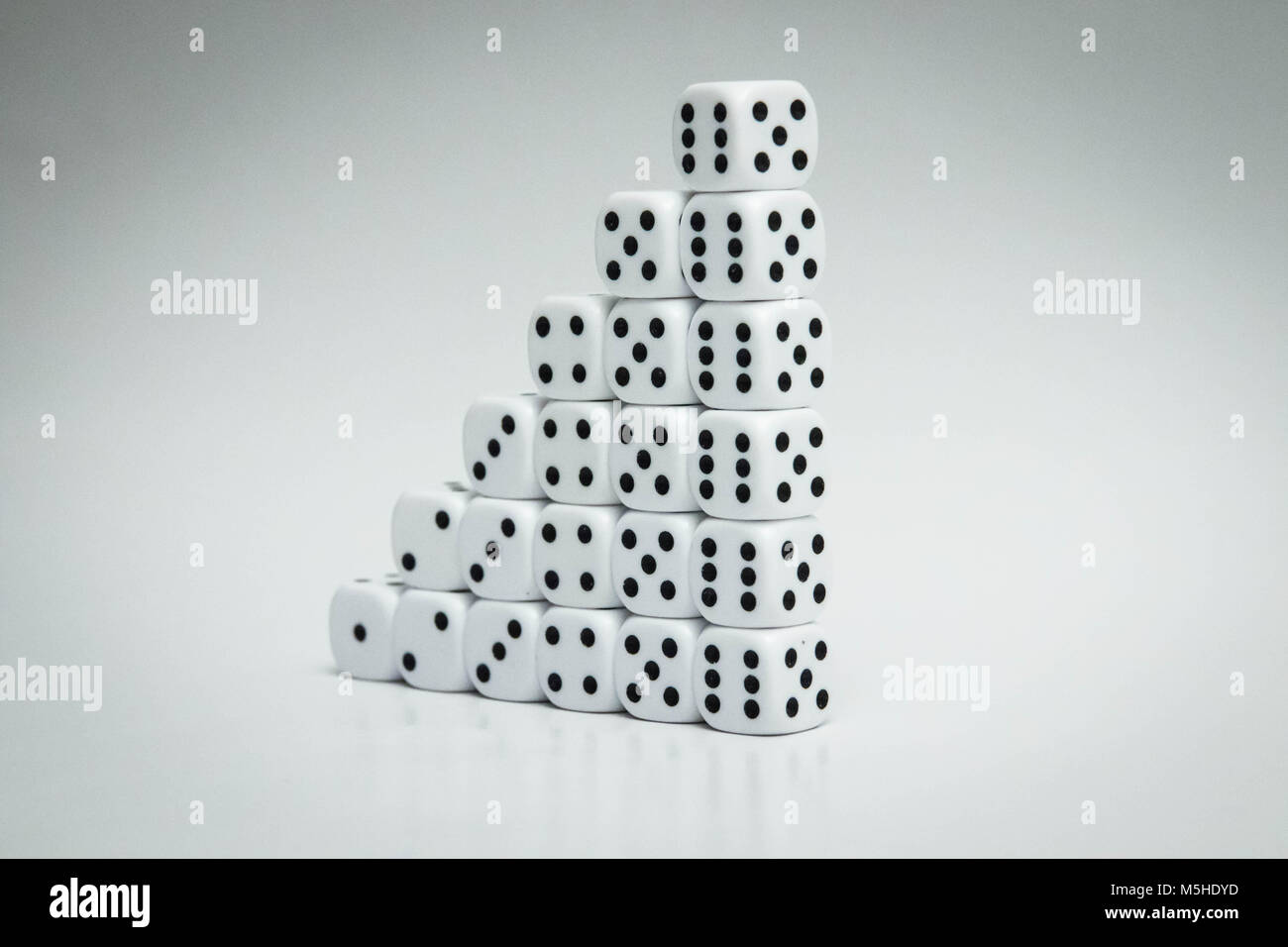 White dice isolated on white multiple dices Pyramid Stock Photo - Alamy