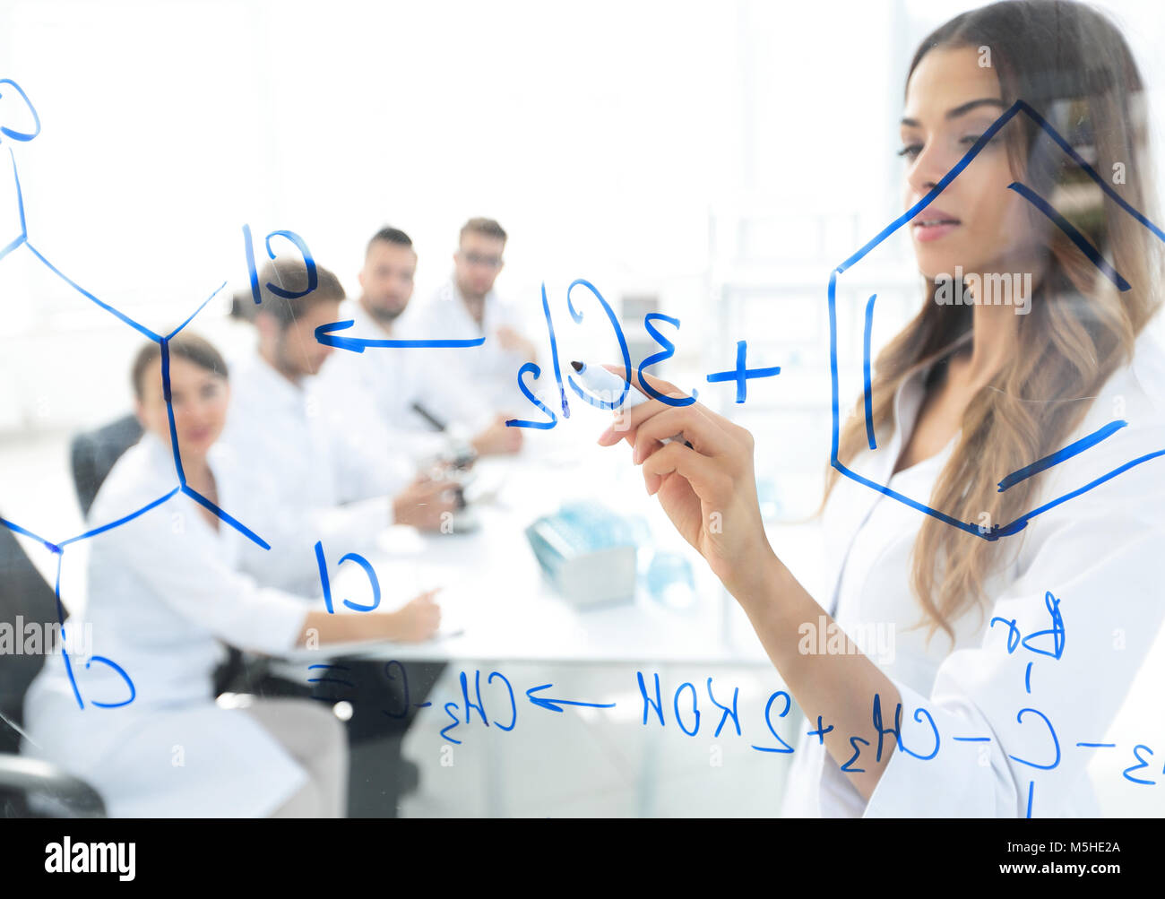 female scientist makes a report to colleagues Stock Photo - Alamy