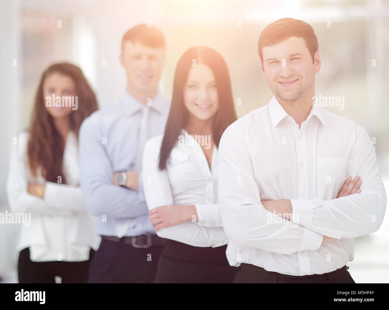 leader and a confident business group Stock Photo - Alamy