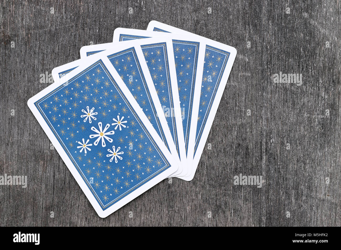 Trump cards back side on grungy wooden table at the studio shot Stock ...