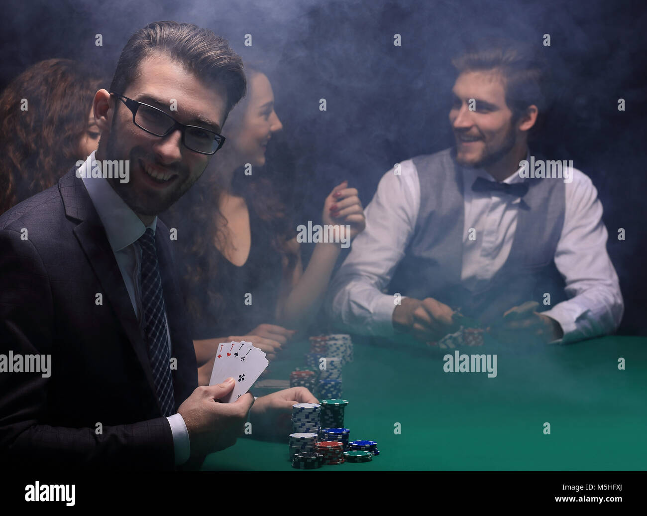 portrait of a poker player Stock Photo - Alamy
