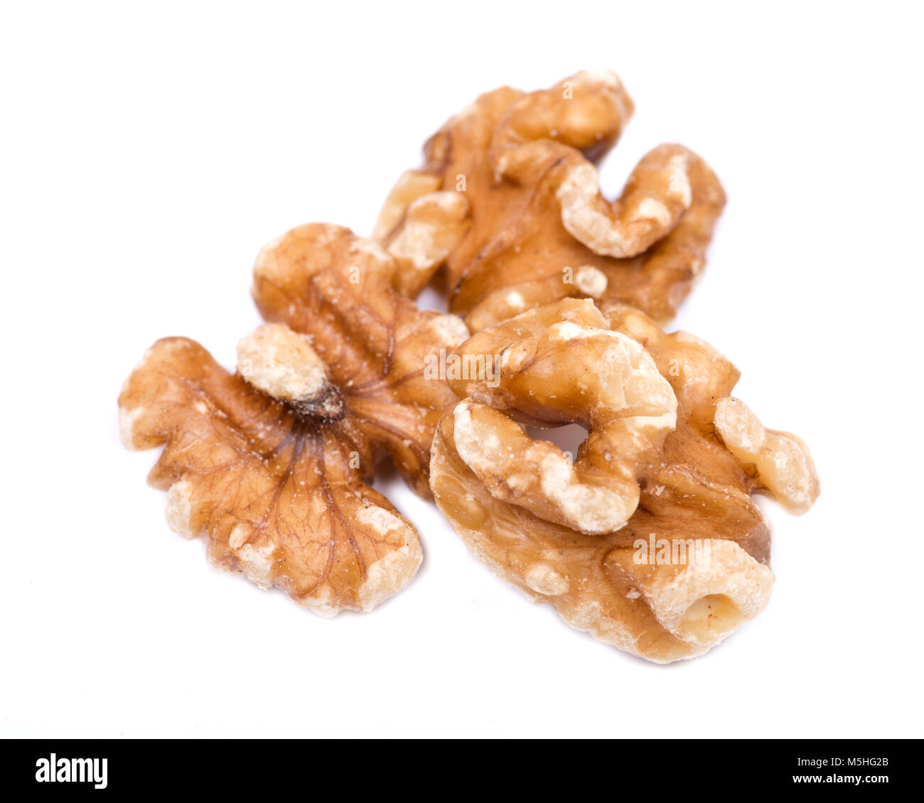 Raw premium walnut halves isolated on white background Stock Photo - Alamy