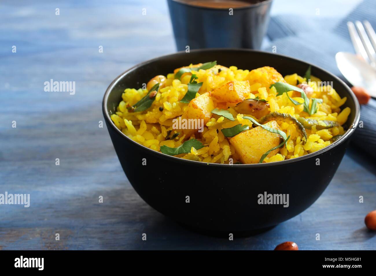 Batata Poha / Indian breakfast with potatoes and flattened rice ...