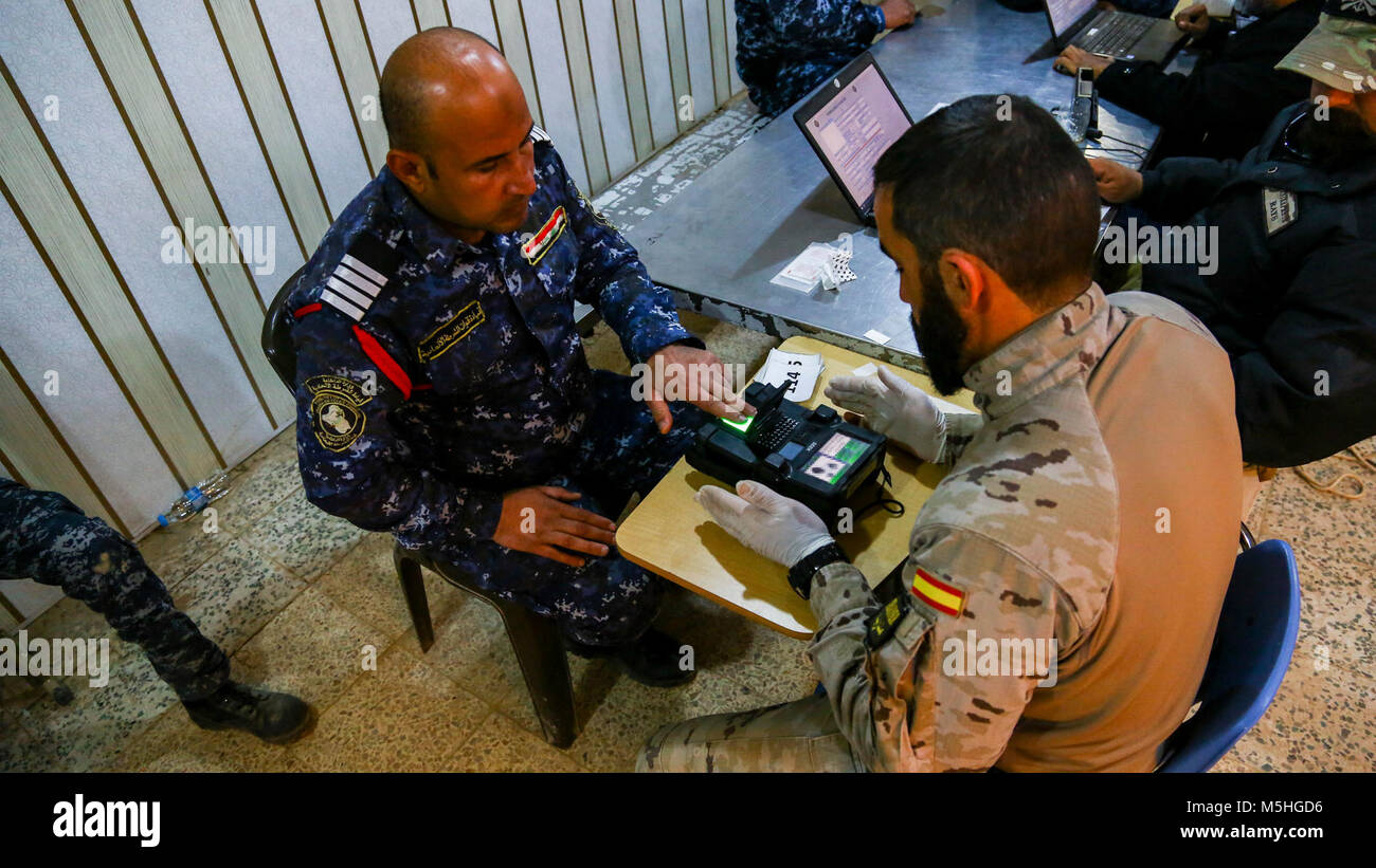 Iraqi federal police attached to 2nd battalion enroll thier biometrics ...