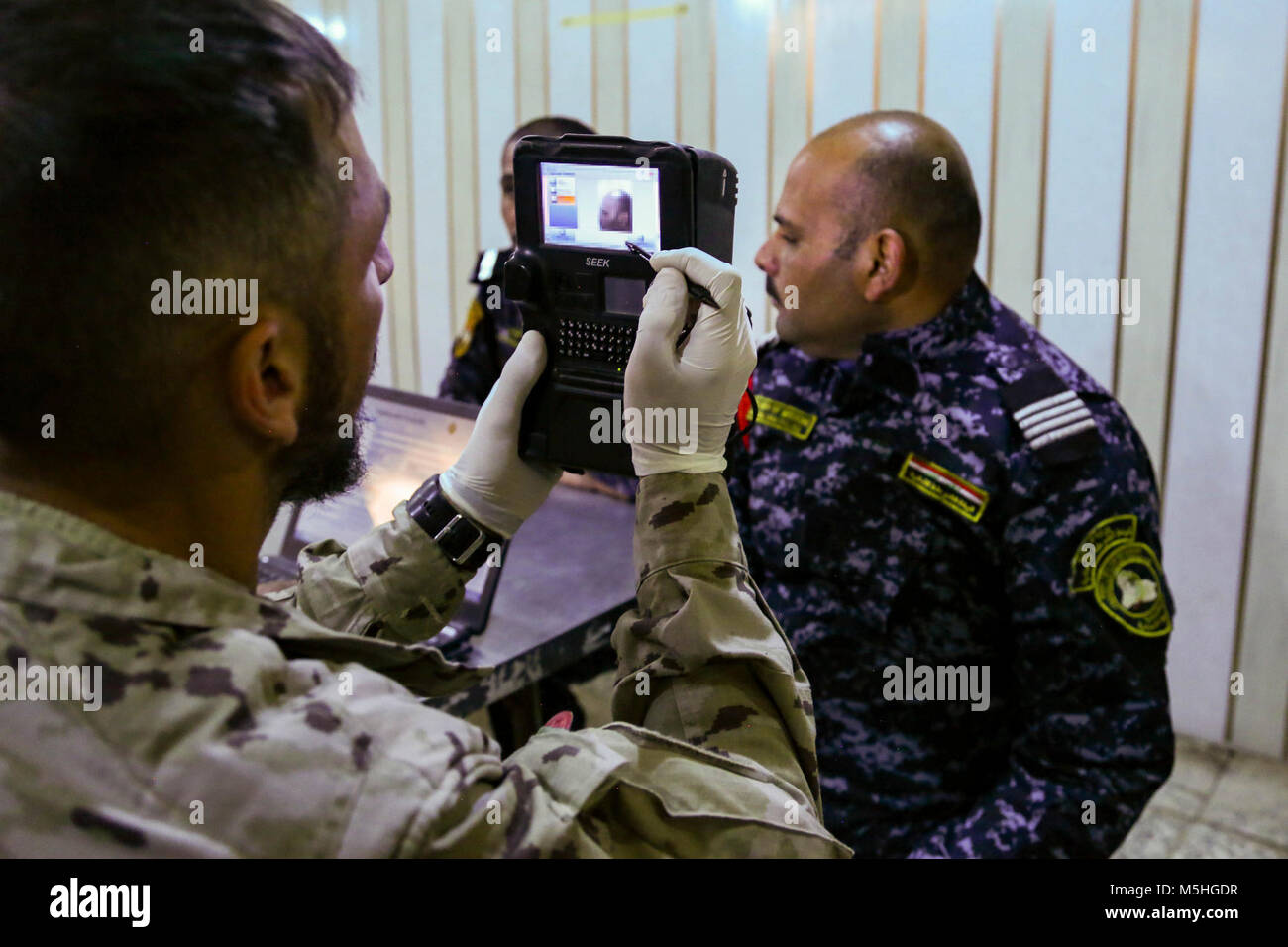 Iraqi Federal Police attached to the 2nd Battalion, enroll their ...