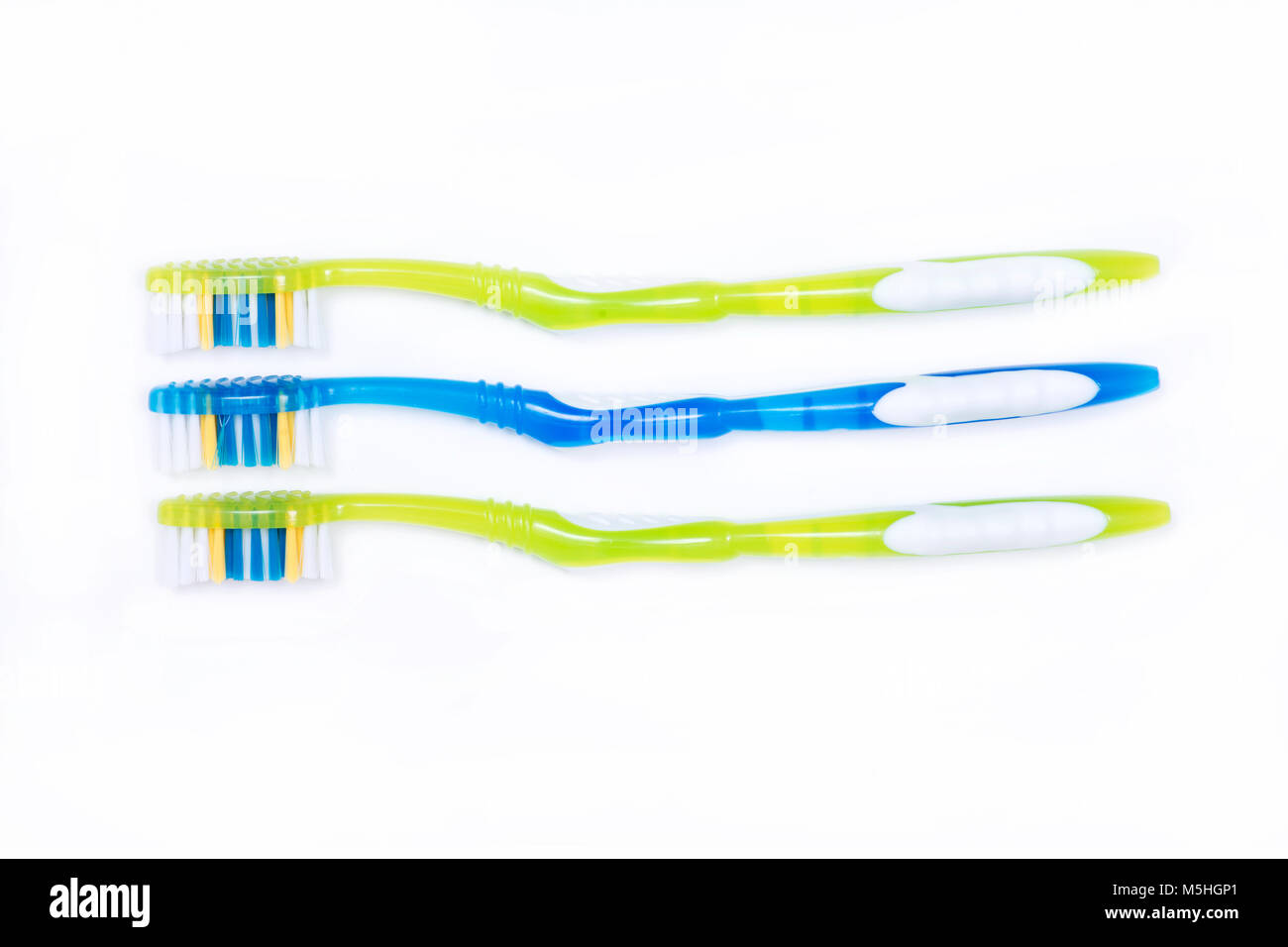 Colorful plastic toothbrush isolated on white background Stock Photo ...