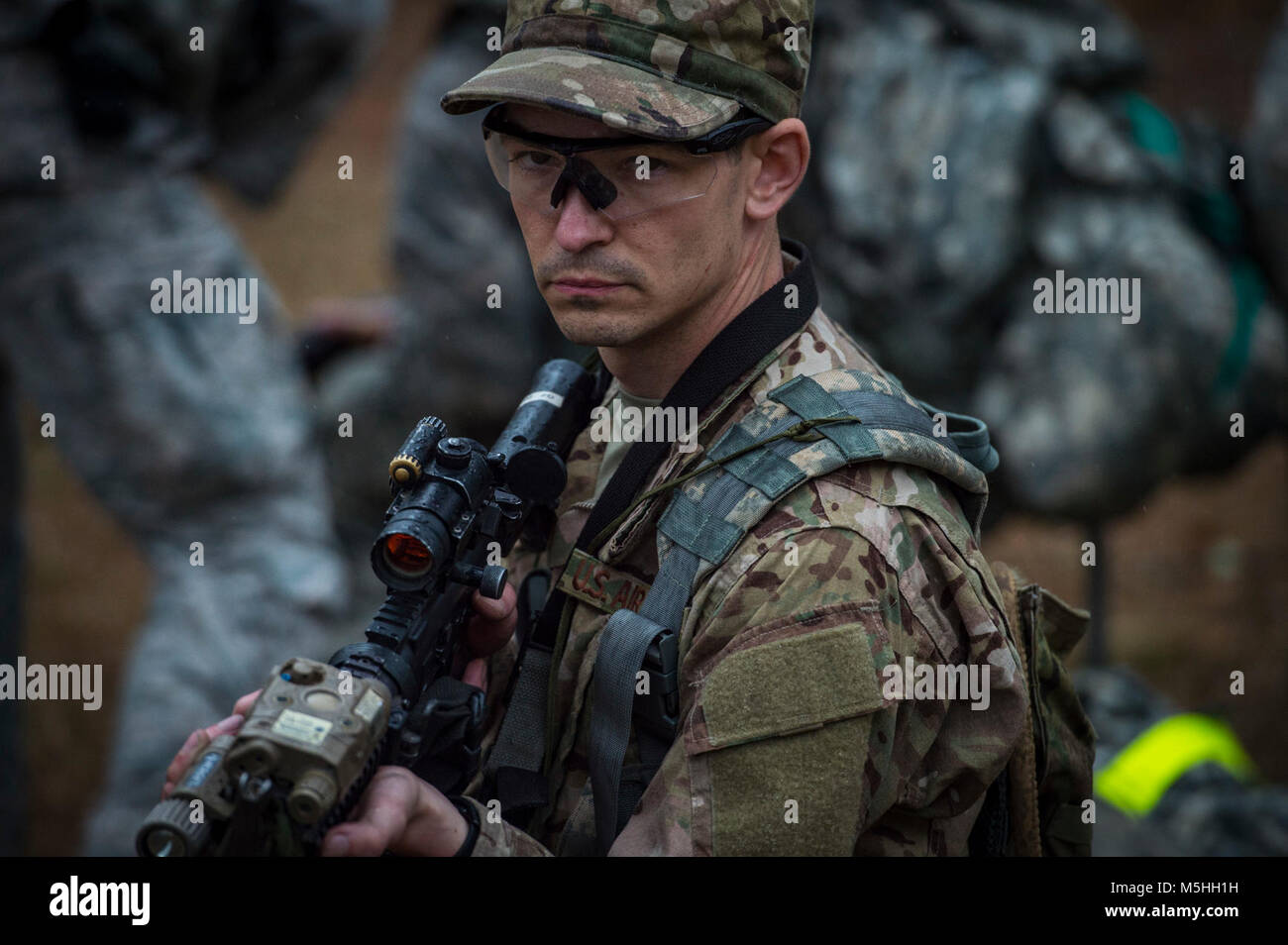 An Airmen provides security during a Pre Ranger Assessment Course, Feb ...