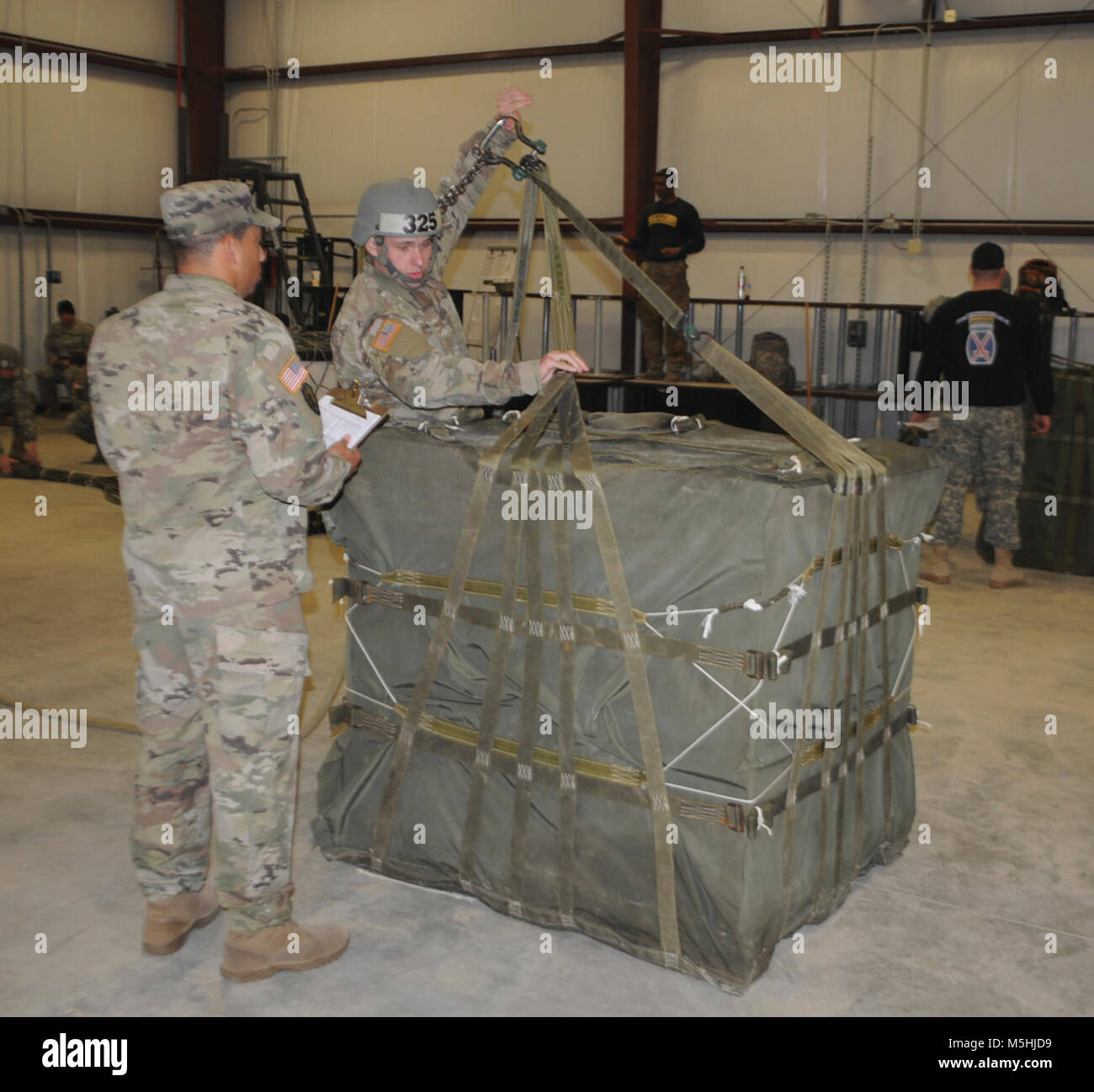 An Air Assault student is graded on his ability to ensure cargo is ...