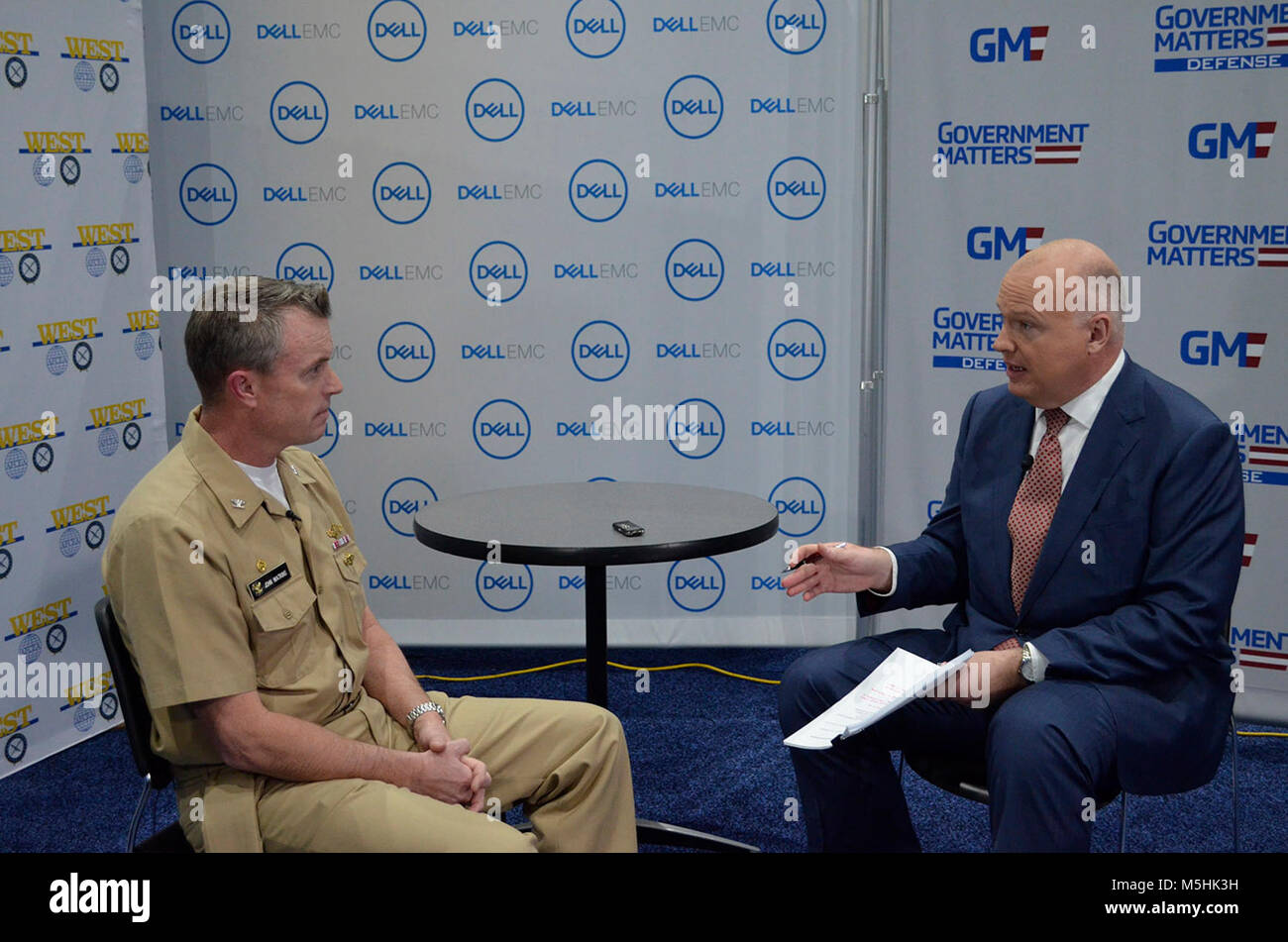 (Left to right) Capt. John Watkins, commanding officer, Naval ...