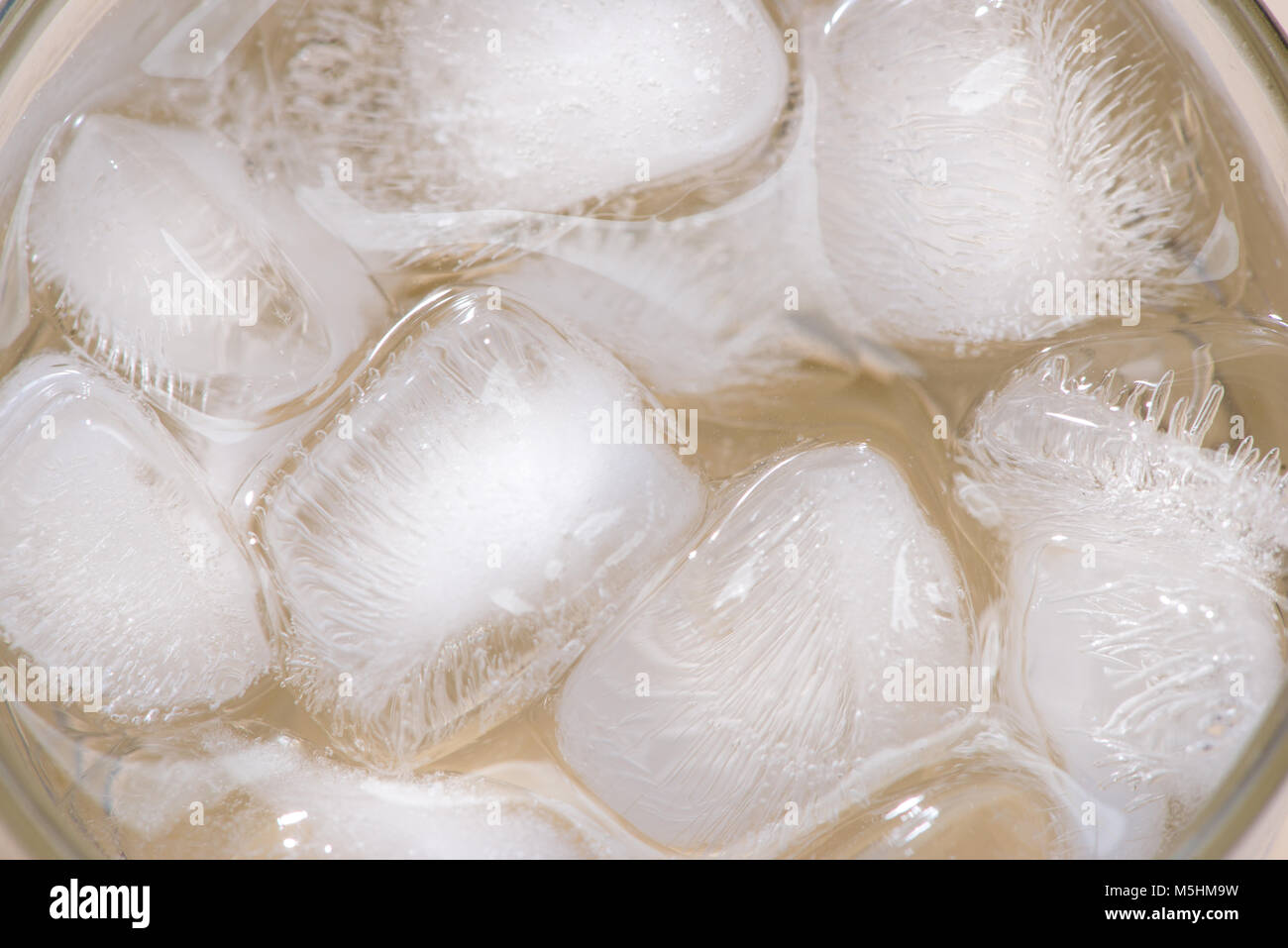 Close up of ice cubes in glass Stock Photo - Alamy
