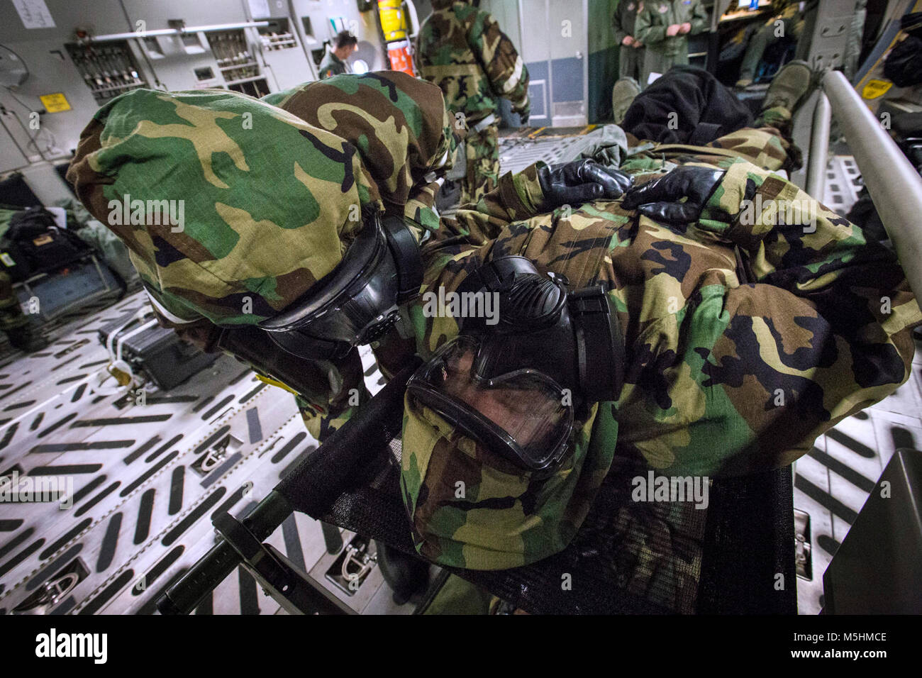 A U.S. Air Force Reserve Citizen Airman, standing, with the 514th ...