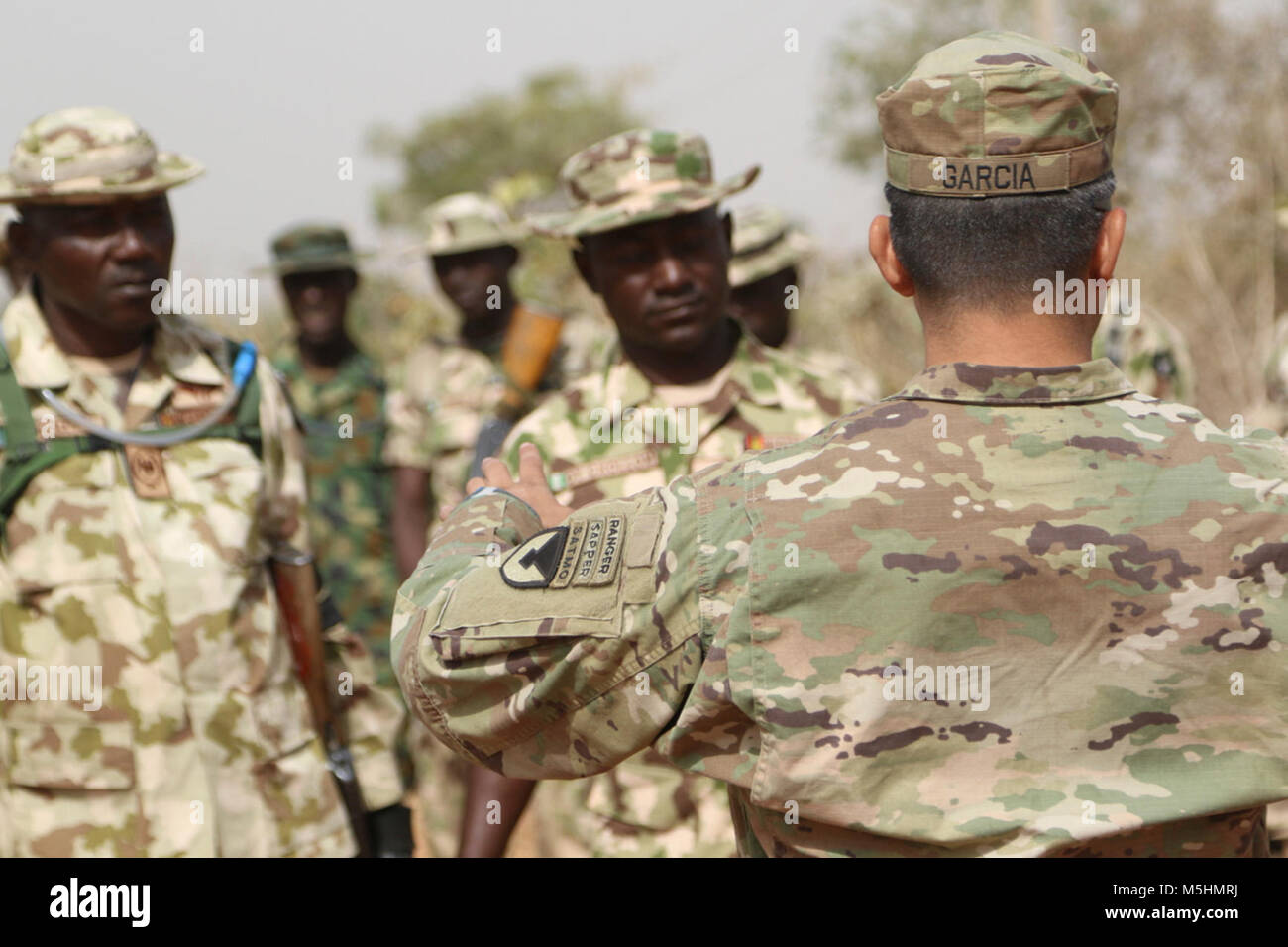 Twelve Soldiers U.S. Army Soldiers share tactics and training with a ...