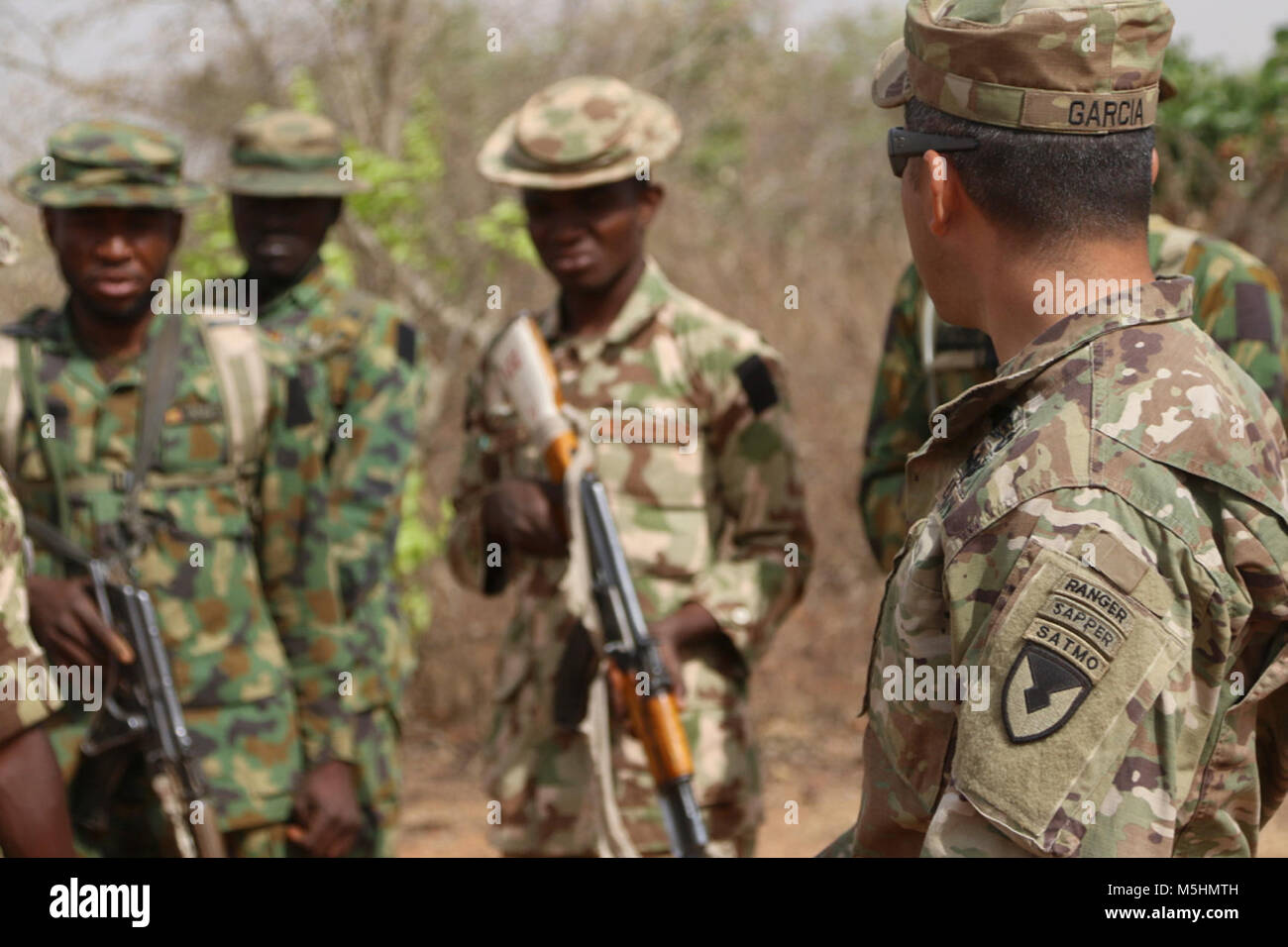 Twelve Soldiers U.S. Army Soldiers share tactics and training with a ...