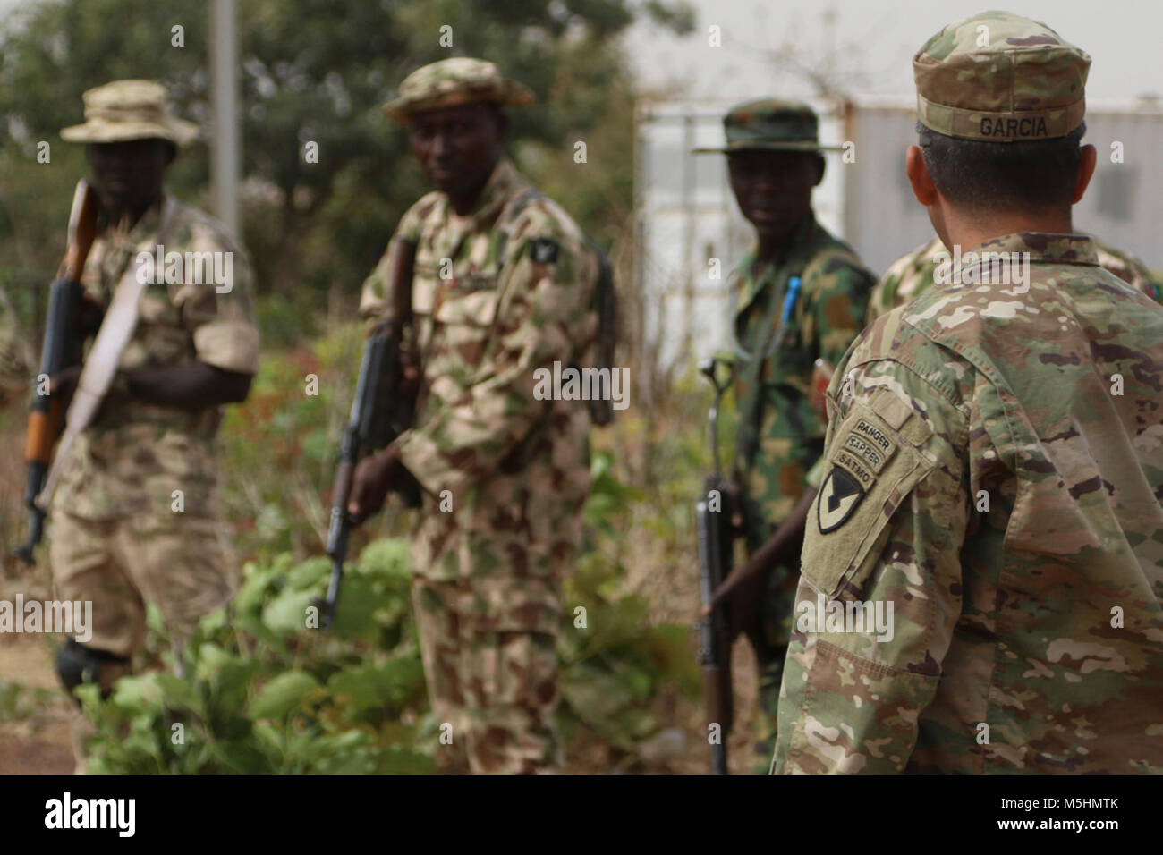 Twelve Soldiers U.S. Army Soldiers share tactics and training with a ...