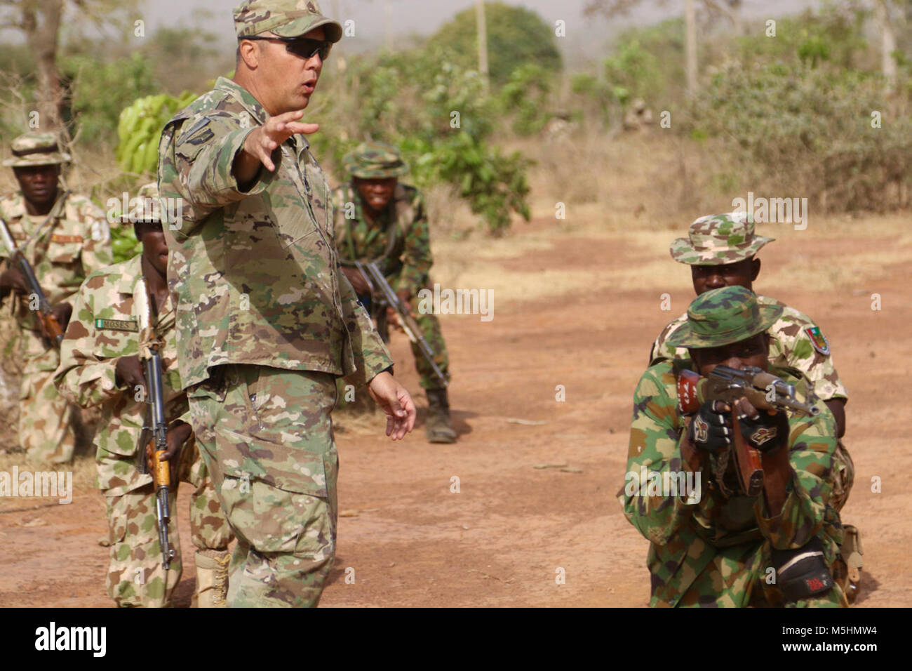 Twelve Soldiers U.S. Army Soldiers share tactics and training with a ...