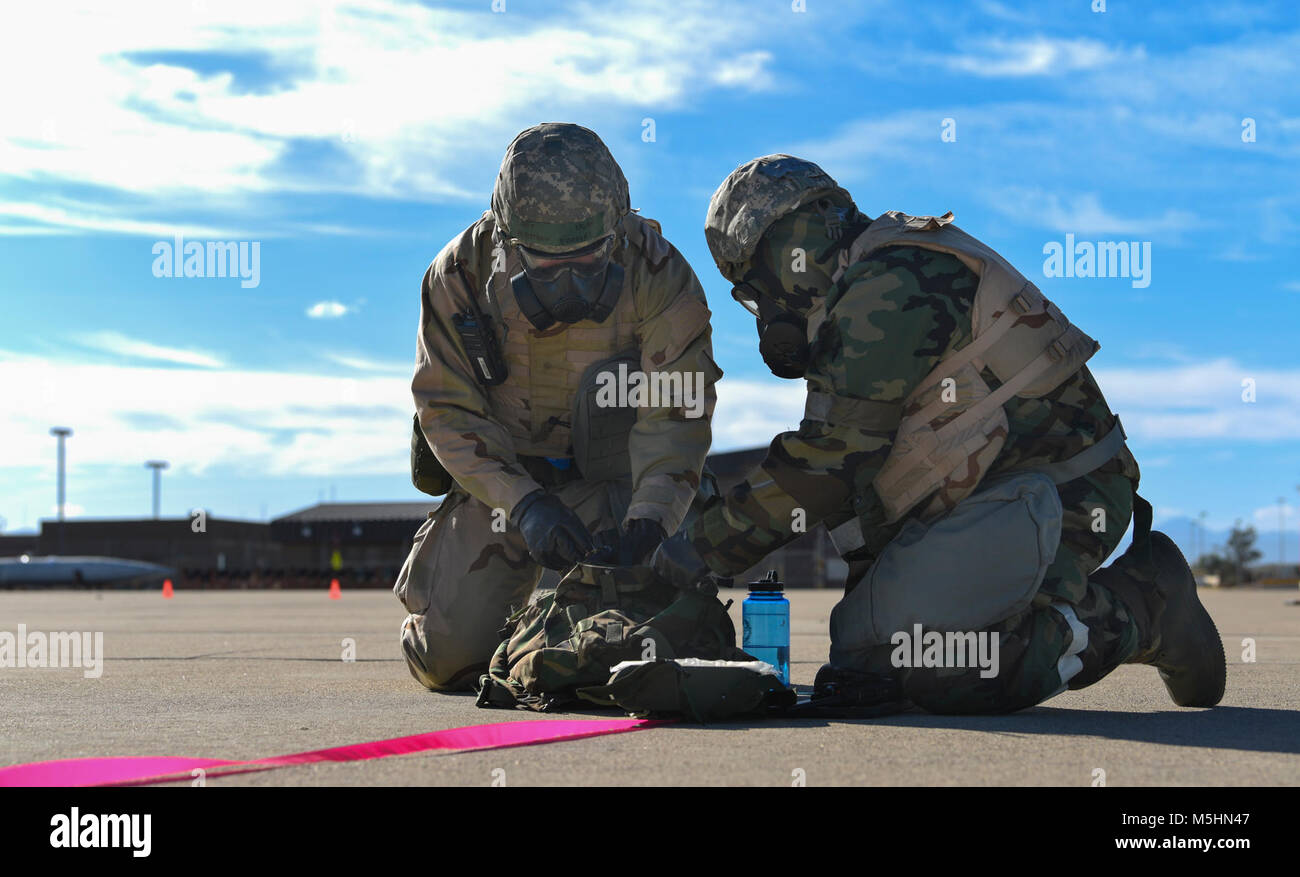 U.S. Airmen prepare to cordon off a simulated unexploded ordnance after ...