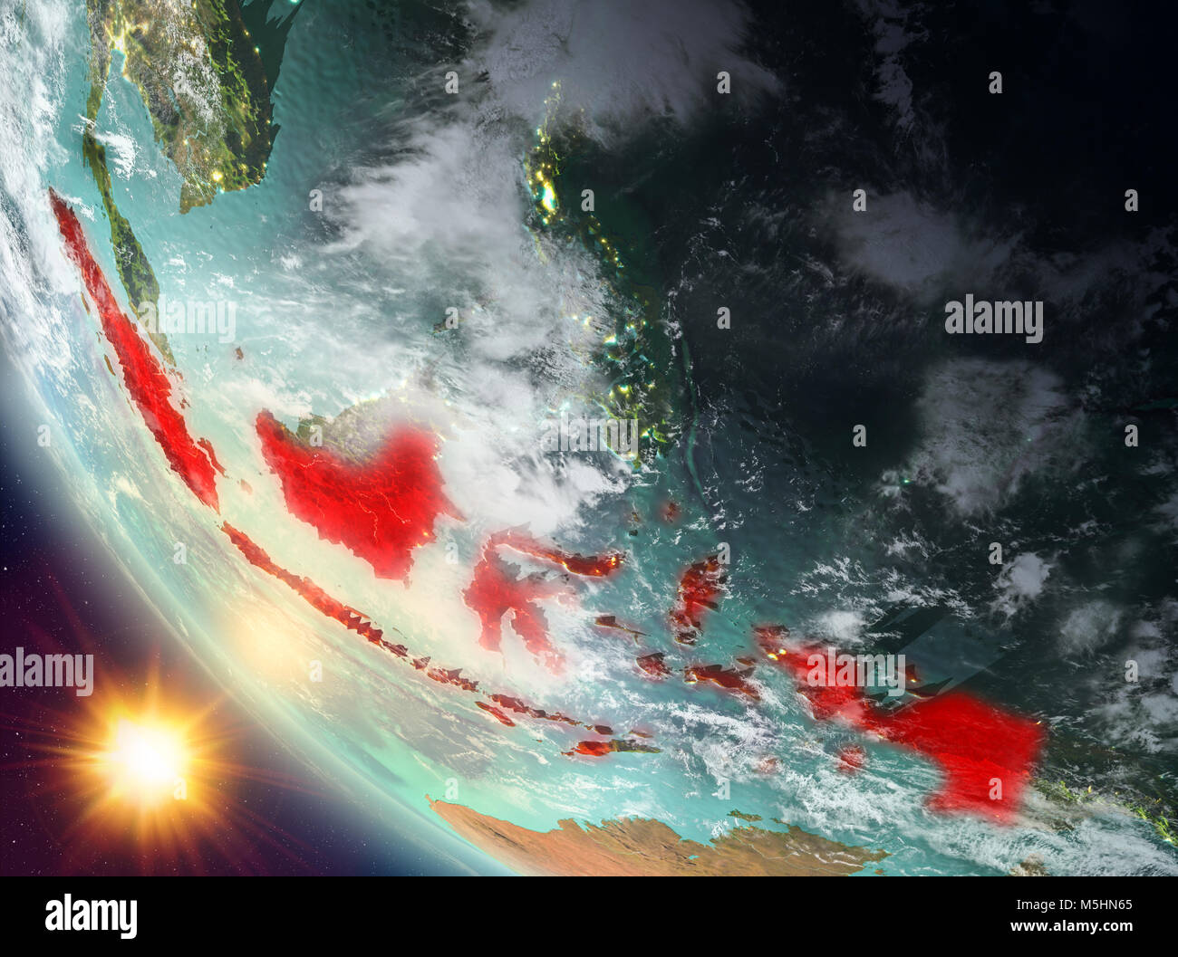 Indonesia during sunset highlighted in red on planet Earth with clouds ...