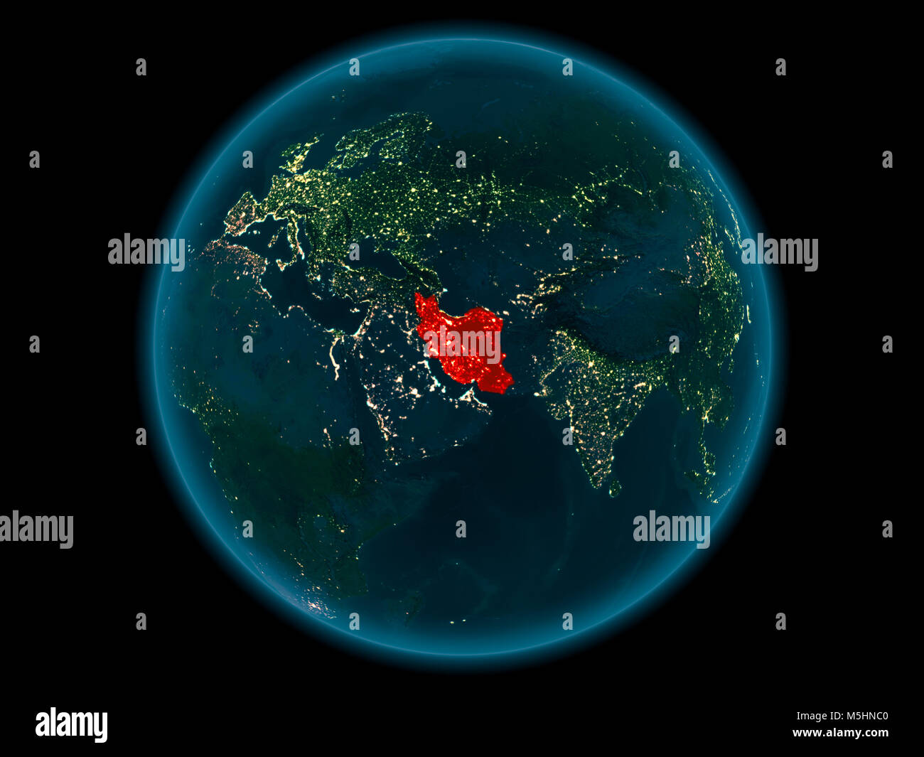 Night above Iran highlighted in red on model of planet Earth in space ...